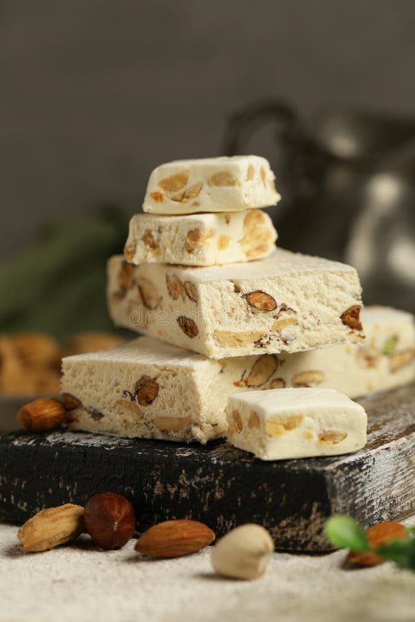 Nougat with Nuts on Parchment Stock Image - Image of cooking, pieces ...