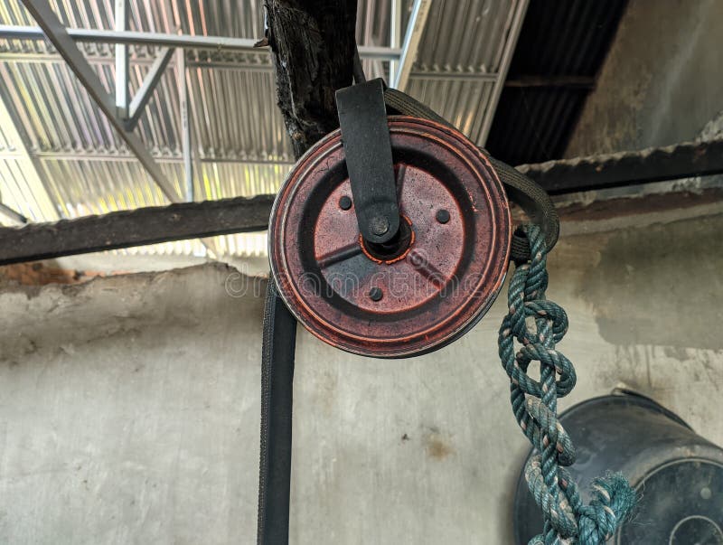 Traditional Old Rusty Water Well Pulley. Stock Image - Image of ancient ...