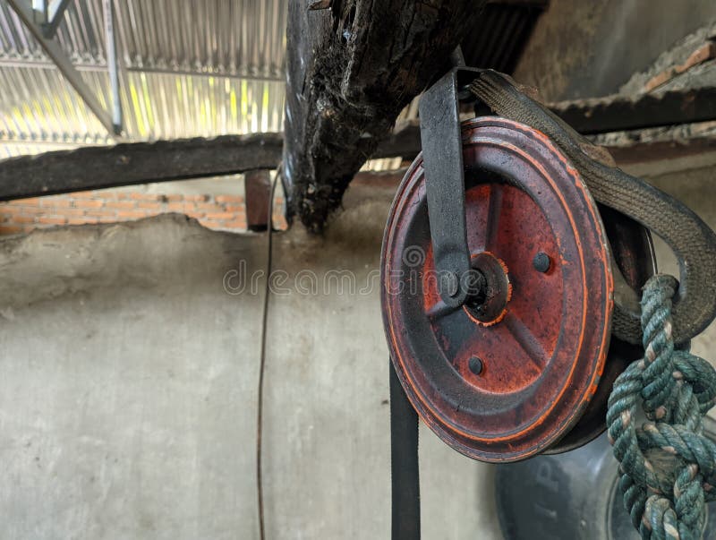 Traditional Old Rusty Water Well Pulley. Stock Photo - Image of closeup ...