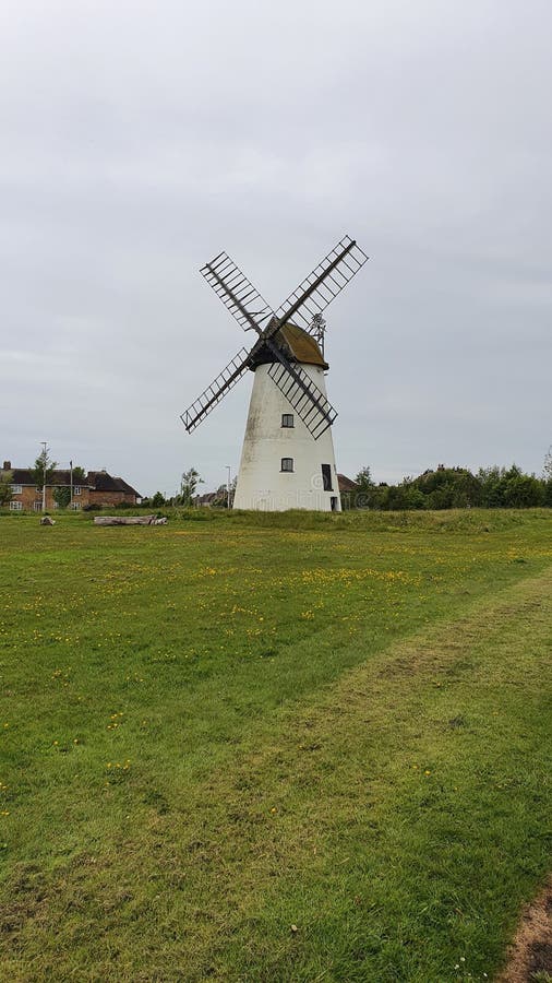Traditional Old White Windmill on the Green Field Stock Photo - Image ...