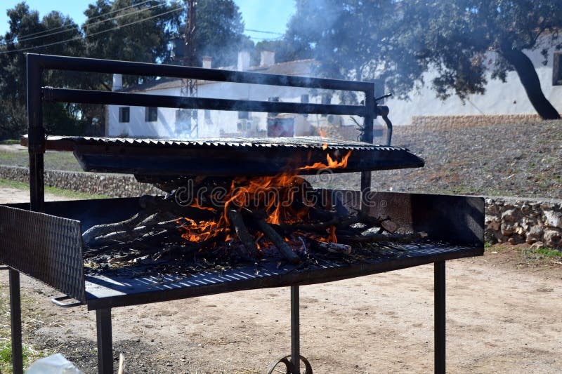 Traditional Outdoor Barbecue Grill with Open Flame in Rural Spain ...