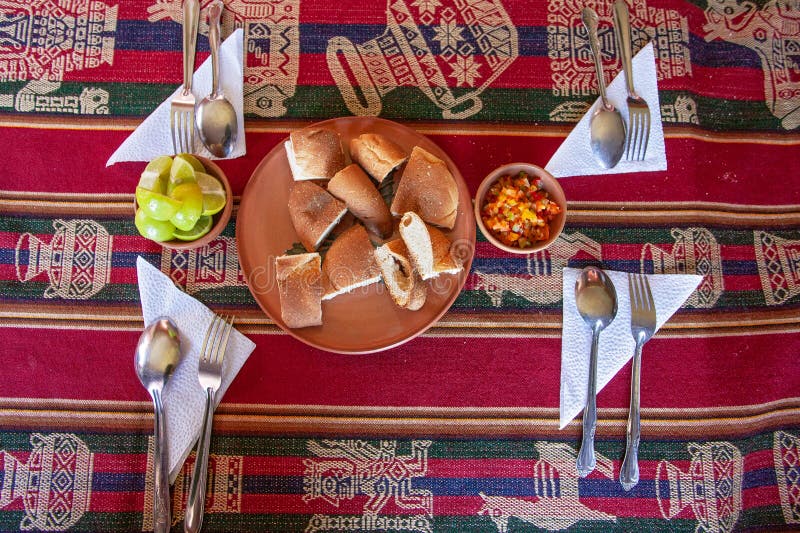 Traditional Peru Dinner, Bread Tortilla and Lime on the Table Stock ...