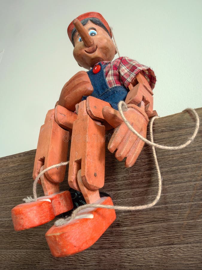 Traditional Puppets Made of Wood.Sit on a Pine Wood Cabinet Stock Photo ...
