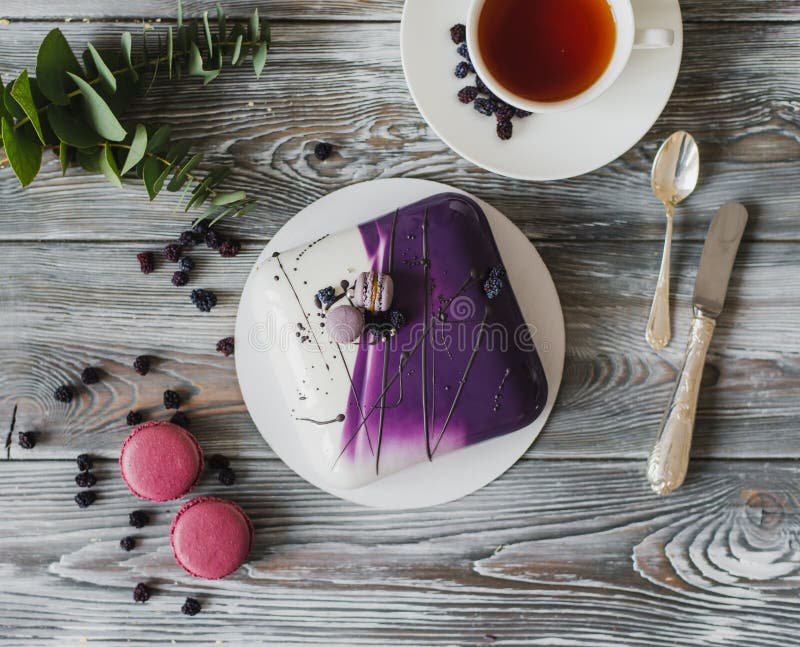 Traditional Purple Berry Cake and Macarons Souffle Dessert and Almond ...