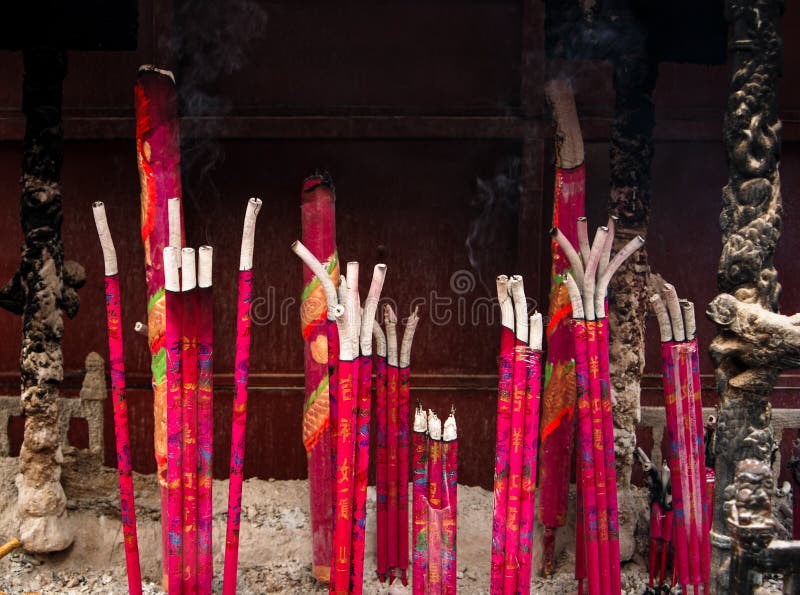 Traditional Red and Pink Incense Sticks Burning in the Incense Burner ...