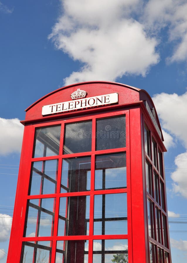 Iconic Telephone Box Soaring into Blue Sky Stock Image - Image of ...