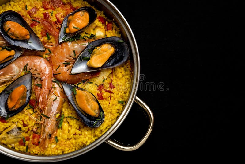 Traditional Rice in Paella with Fish and Meat. Stock Photo - Image of ...