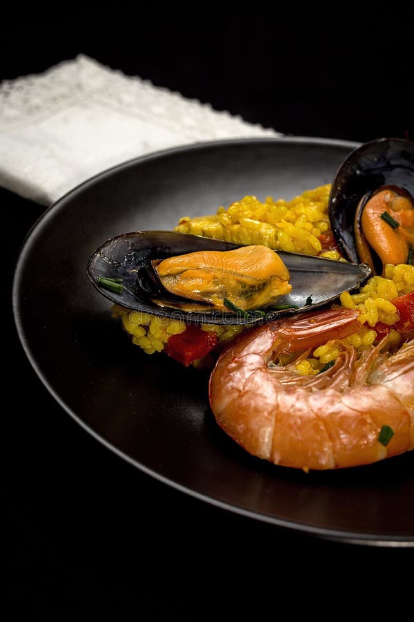 Traditional Rice in Paella with Fish and Meat. Stock Photo - Image of ...