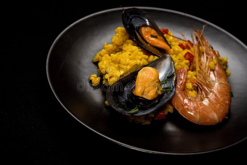 Traditional Rice in Paella with Fish and Meat. Stock Image - Image of ...