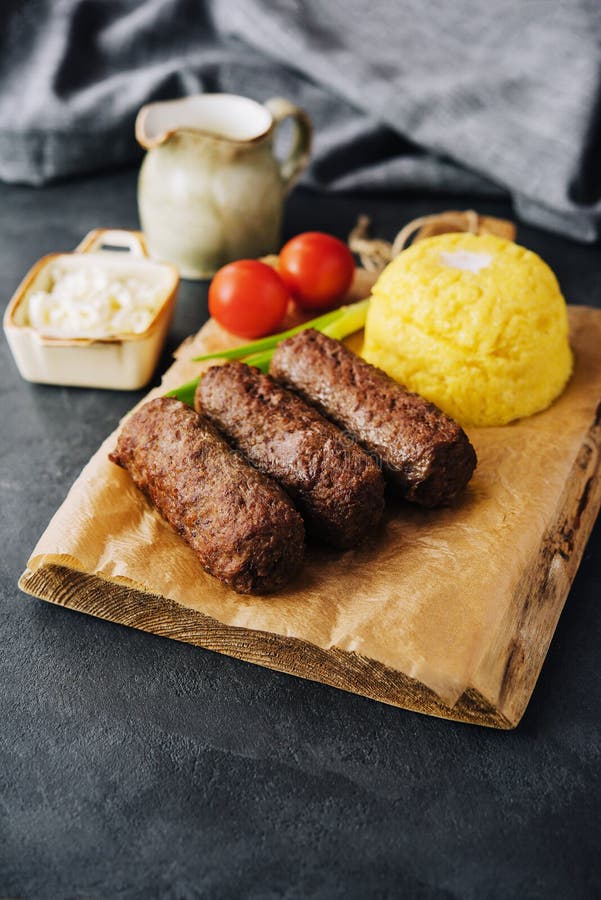 Traditional Romanian Grilled Dish - Mici or Mititei Stock Photo - Image ...