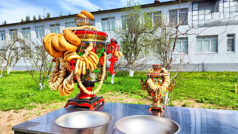 Traditional Russian Bread Display with Decorative Elements in a Garden ...