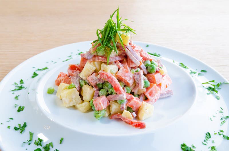 Russian salad on plates stock image. Image of salad, leaves - 3544173