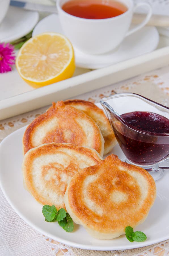 Traditional Russian Lush Pancakes on Kefir with Jam Stock Photo - Image ...