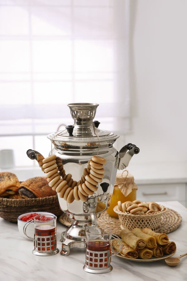 Traditional Russian Samovar with Treats on White Table at Home Stock ...