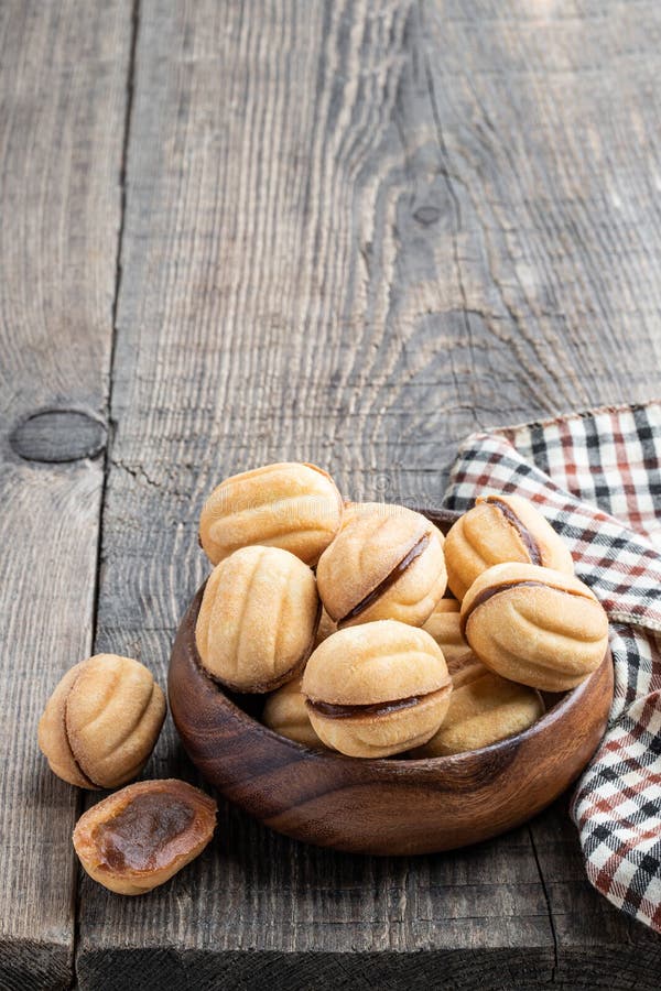Traditional Russian Walnut Tea-cakes in Wooden Bowl on Rustic Table ...