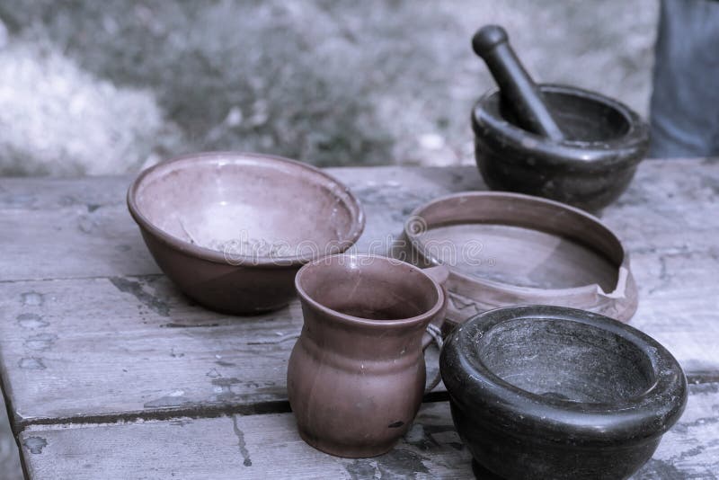 Traditional Rustic Crockery Ceramic Plates and a Clay Jug Standing on a ...