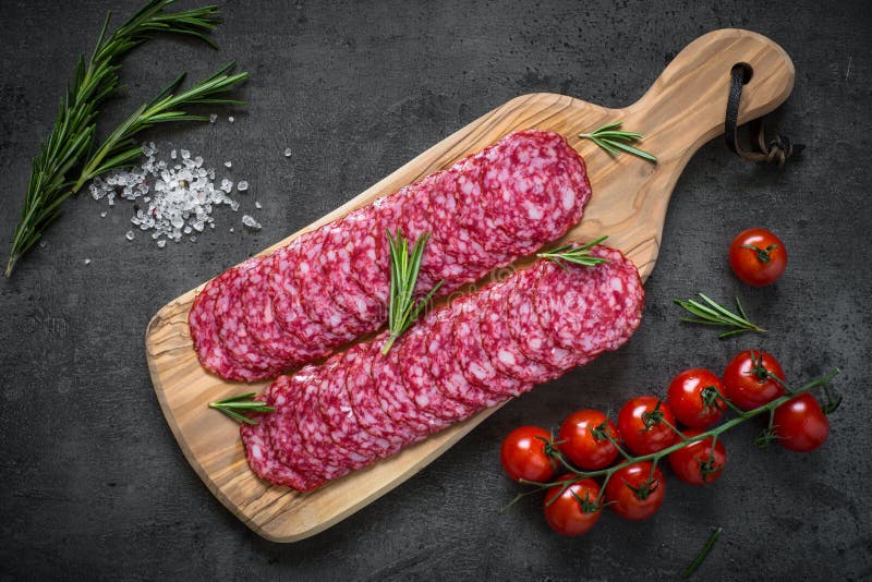 Traditional Salami Sliced on Cutting Board. Stock Photo - Image of ...