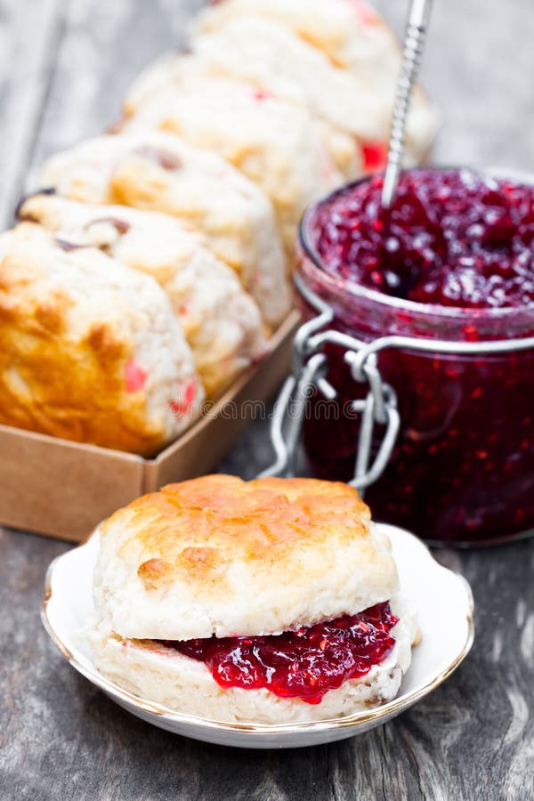 Scone Filled with Strawberry Jam and Clotted Cream Stock Image - Image ...