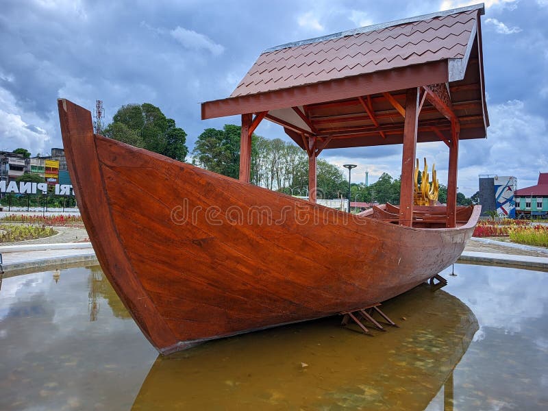 A Traditional Ship-shaped Building Located in the Middle of the Park ...