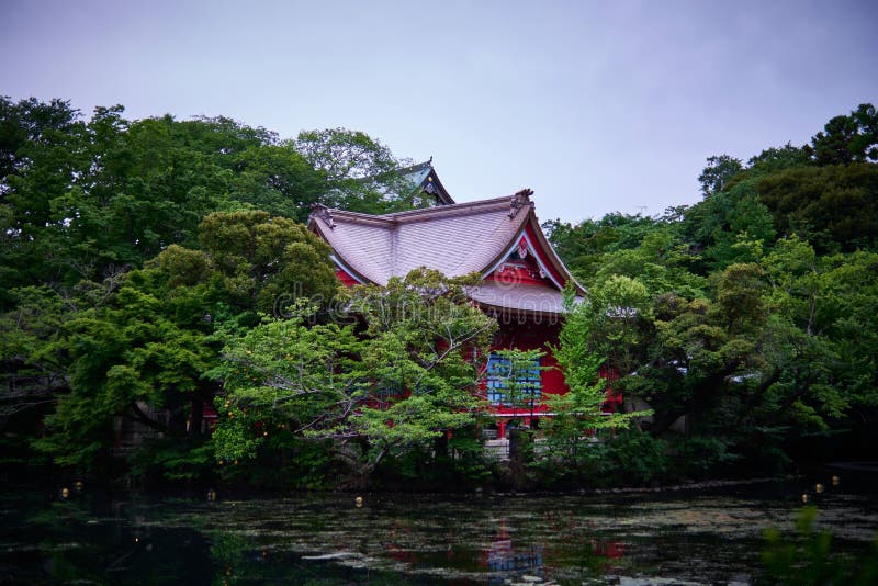 Traditional Shrine Building Surrounded by Trees and a Lake Editorial ...