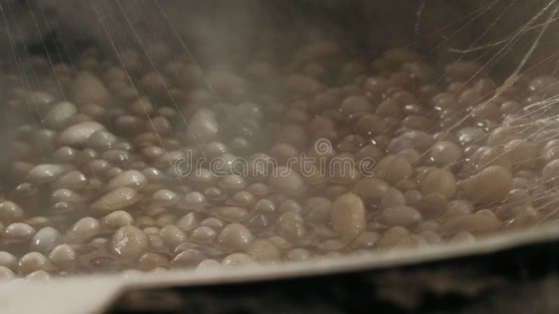Traditional Silk Production. Processing Boiling Silkworm Cocoons in Hot ...