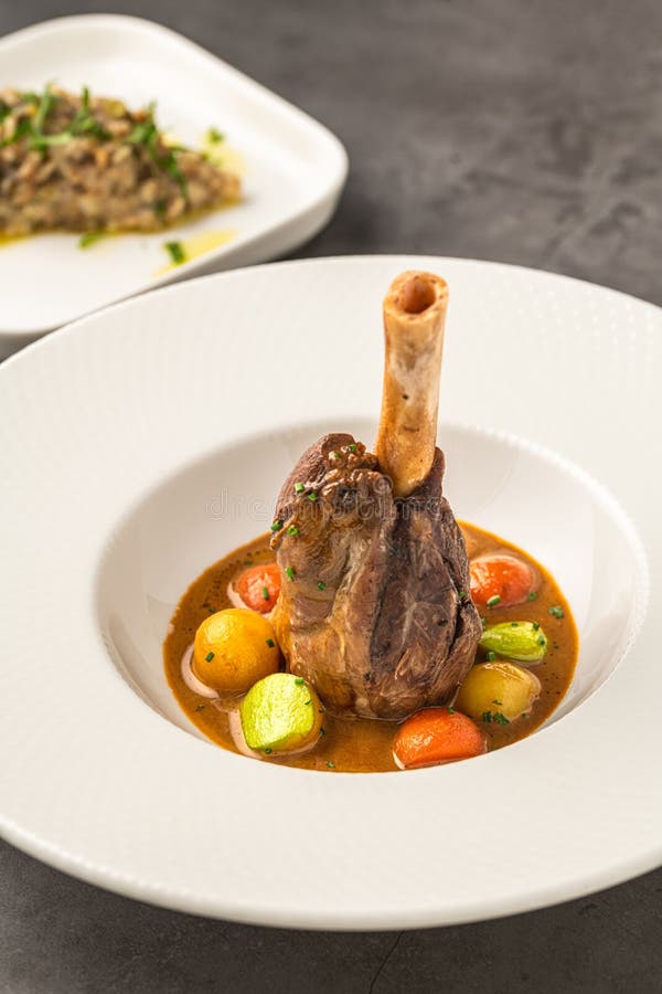 Traditional Slow-cooked Braised Lamb Knuckle or Lamb Shank with Sauces ...