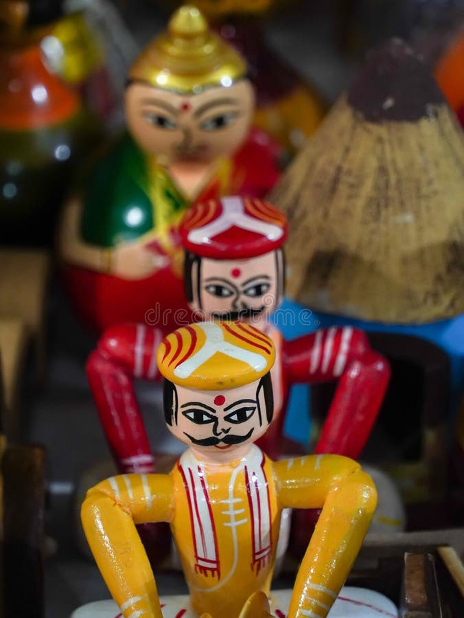 Traditional Small Statue of a Indian Man in Yellow Dress Code Stock ...