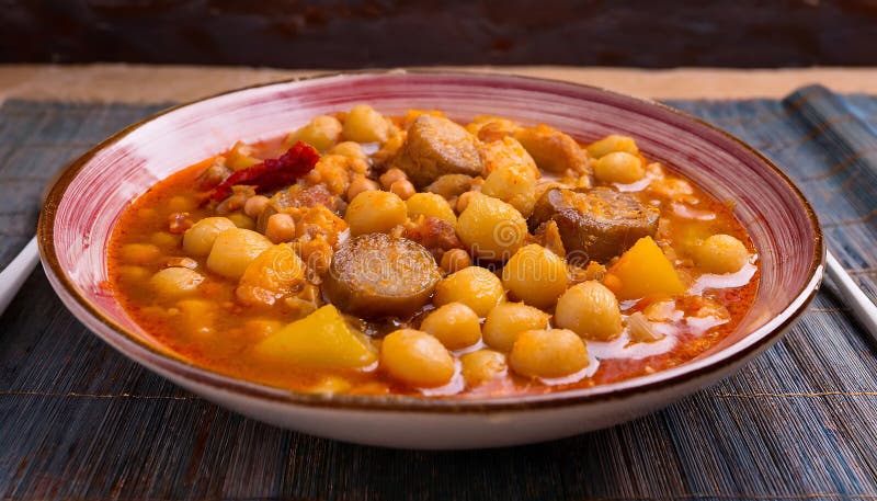Traditional Spanish Chickpea Stew with Chorizo and Potatoes in a Rustic ...