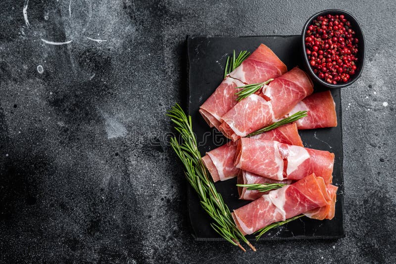 Traditional Spanish Jamon Serrano Ham on Marble Board. Black Background ...