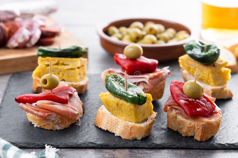 Traditional Spanish Pintxos Stock Photo - Image of serrano, pintxo ...