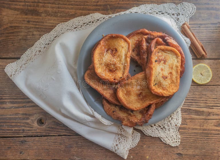 Traditional Spanish Torrijas on a Rustic Table. Typical Spanish Easter ...