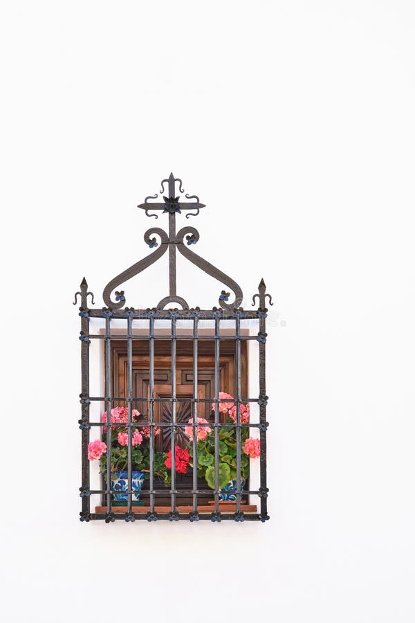 Traditional Spanish Window with Flower Pots on White Wall Stock Photo ...