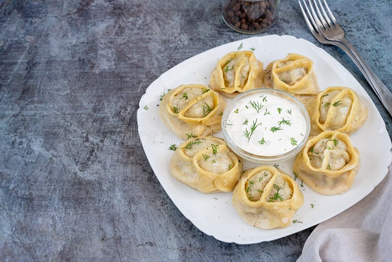 Traditional Steamed Manti with Yogurt and Dill Stock Photo - Image of ...
