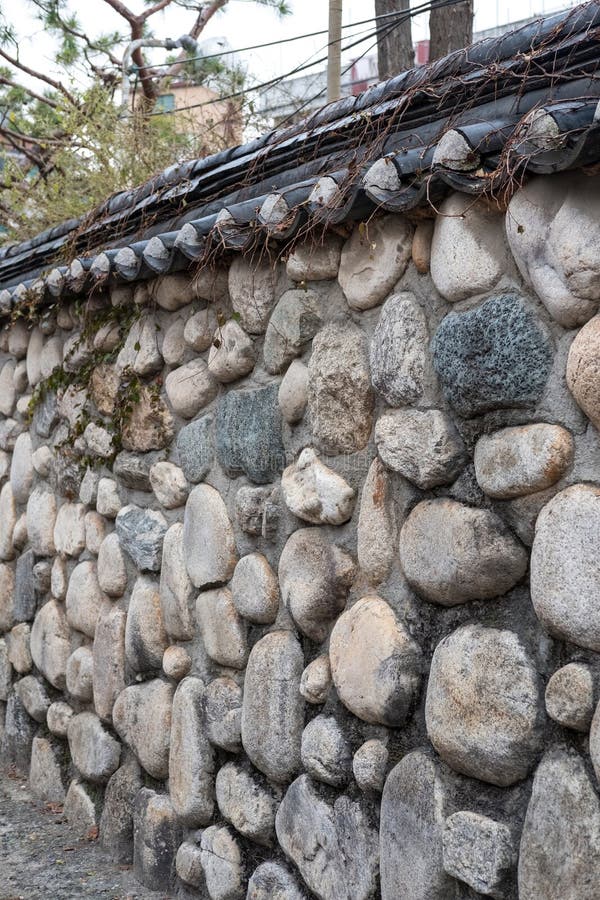 Stone Wall with Plants and Pink Flowers Stock Image - Image of korea, rock: 283403075