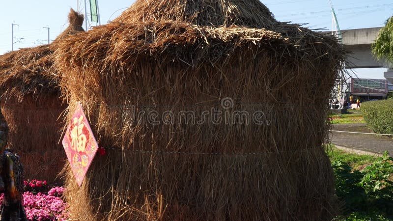 Traditional Straw Stack with Fabric Decoration in Rural Setting Stock ...