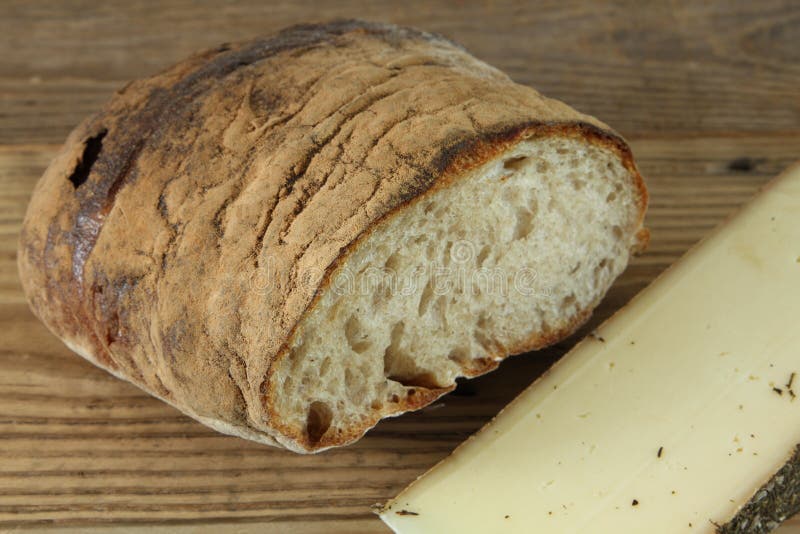 Traditional Swiss Cheese with Bread on Wooden Table Stock Image - Image ...