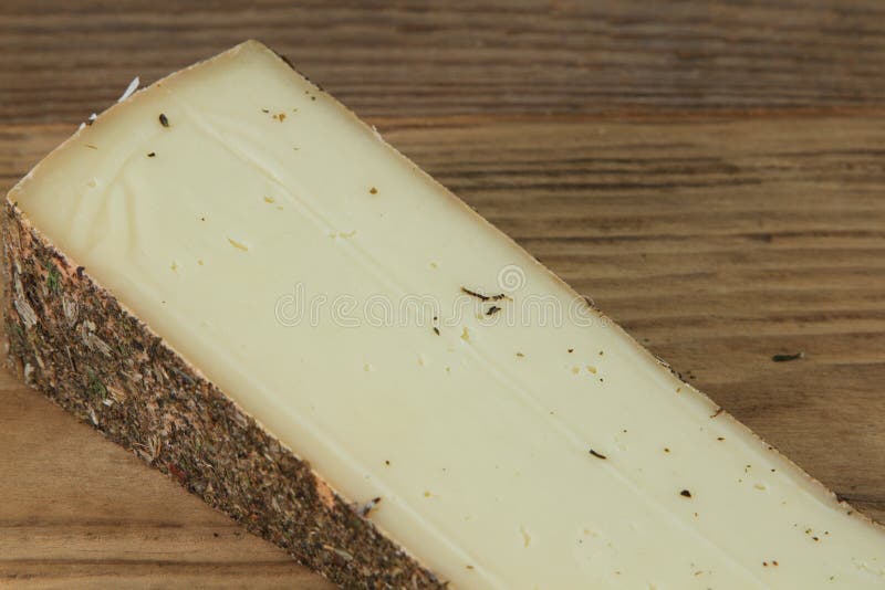 Traditional Swiss Cheese on Wooden Table Stock Photo - Image of ...