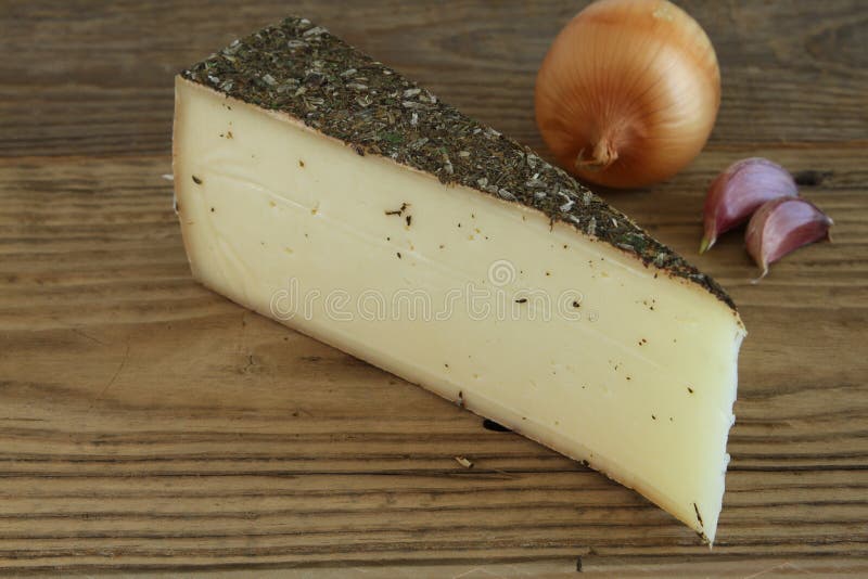 Traditional Swiss Cheese on Wooden Table Stock Photo - Image of wooden ...