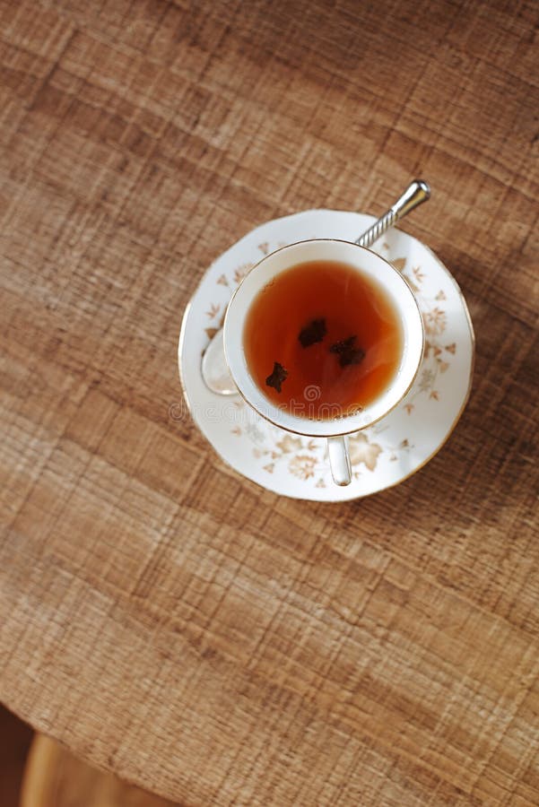 Traditional Tea on Wooden Cafe Table Stock Image - Image of light, leaf ...