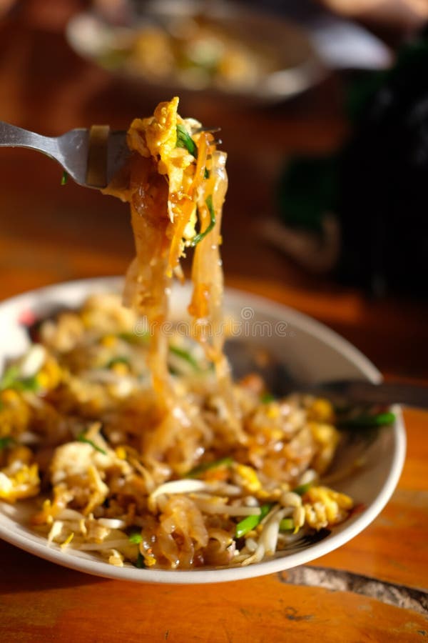 Traditional Thai Fried Noodles Stock Photo - Image of dinner, sauce ...