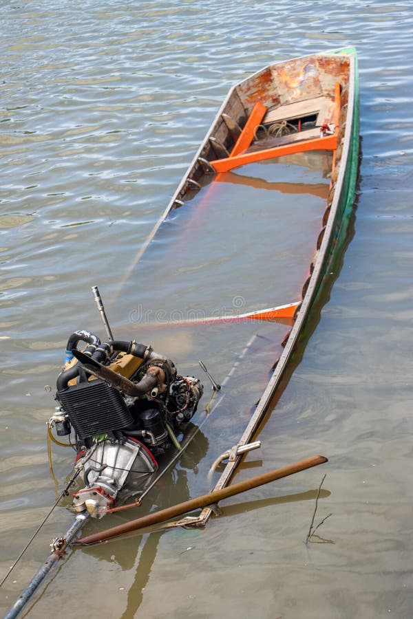 A Traditional Thai Long Tail Boat is Sinking Stock Photo - Image of surface, flood: 336214168