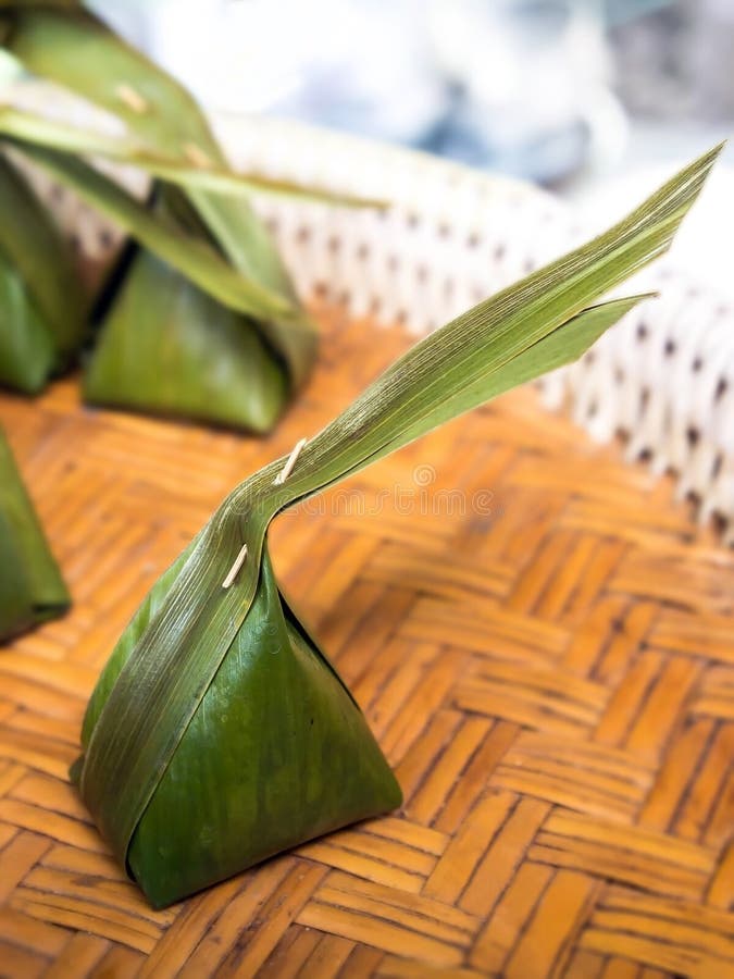 Traditional Thai Sweets Wrapped with Banana Leaf and Coconut Leaf Stock ...