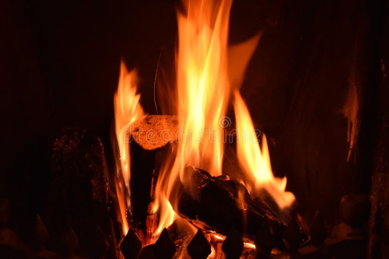 Traditional Turf Briquette Fire Burning Warmly and Brightly Stock Photo ...