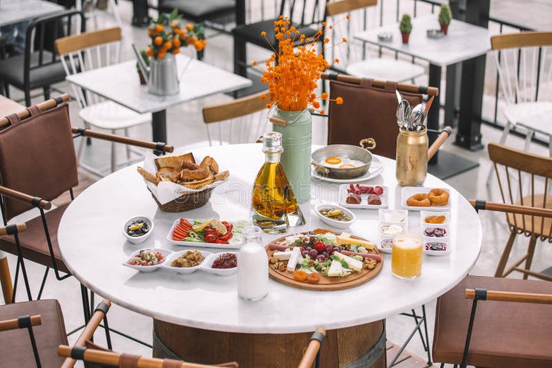 Breakfast Table with Various Dishes, Breakfast Table with Variety of ...