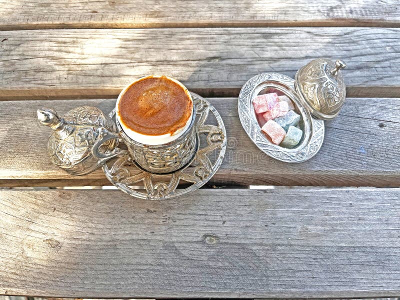 Traditional Turkish Coffee and Turkish Delight on a Wooden Table Stock ...