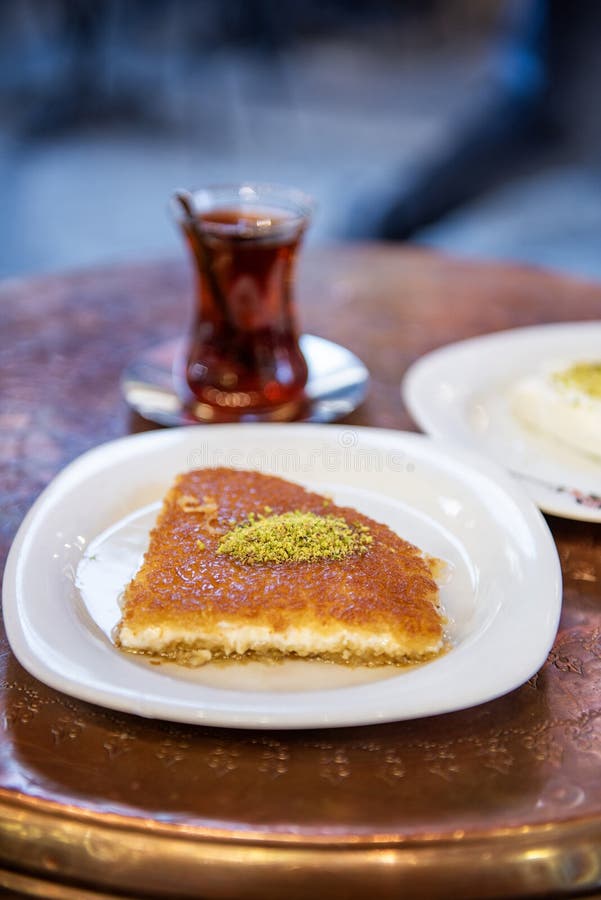 Traditional Turkish Dessert Kunefe with Turkish Tea and Ice Cream ...