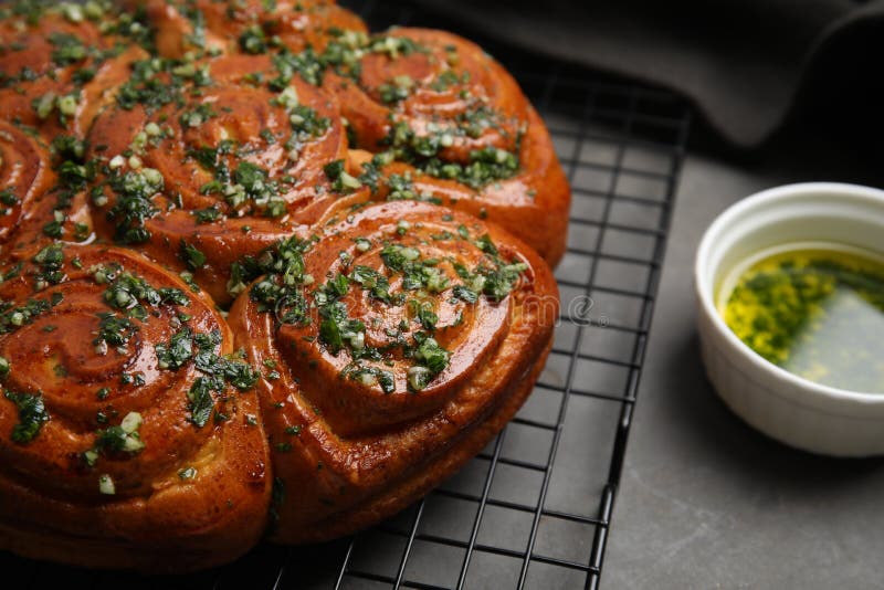 Traditional Ukrainian Garlic Bread with Herbs Pampushky on Grey Table ...