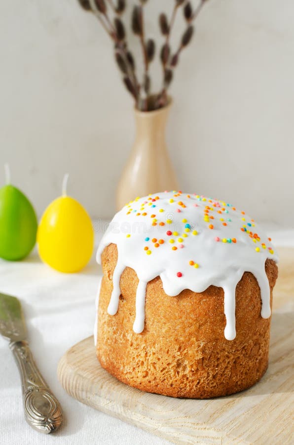 Traditional Ukrainian Kulich on a Cutting Board on a White Tablecloth ...