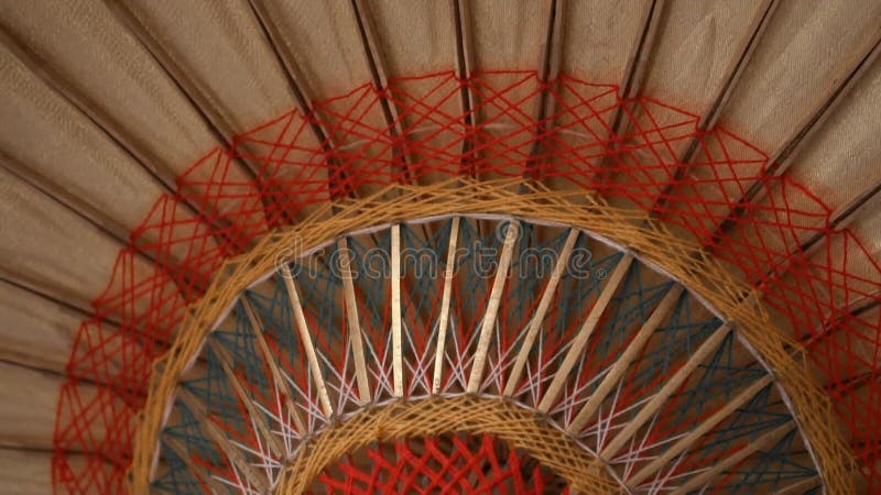 An Traditional Umbrella that Has a Pattern of Orange-colored Bamboo ...