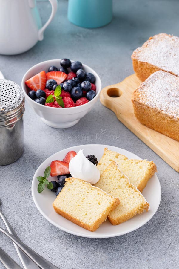 Traditional Vanilla Pound Cake Sliced and Served with Whipped Cream and ...